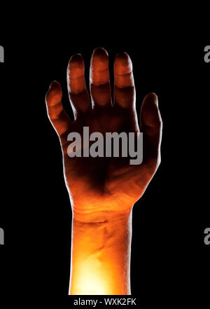 A Man's hand lit from below Stock Photo - Alamy