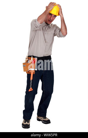 A construction worker afraid of something falling Stock Photo - Alamy