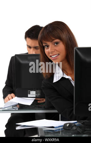 Office workers entering data Stock Photo - Alamy