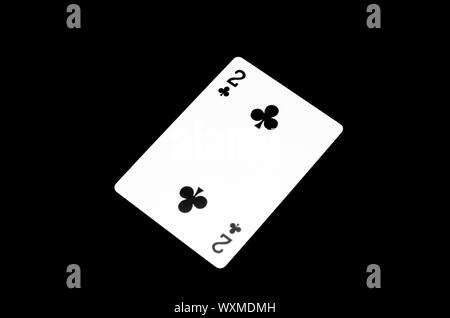 number two clover card isolated on black Stock Photo - Alamy