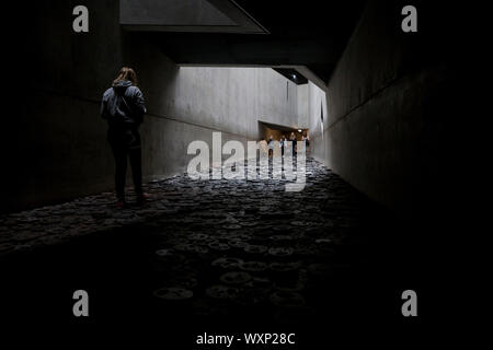 People visiting the Fallen Leaves installation in the Memory Void at ...