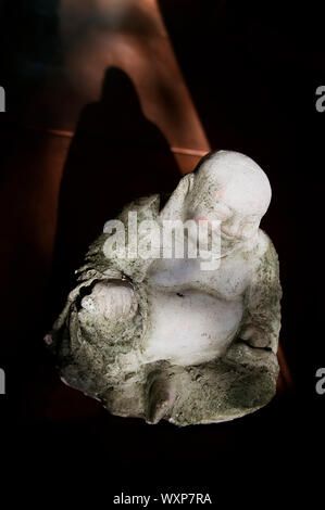 Concrete Buddha Statue in bright Afternoon Light Stock Photo - Alamy