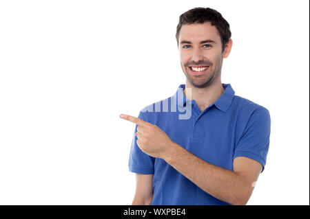 Guy facing camera, pointing away Stock Photo - Alamy