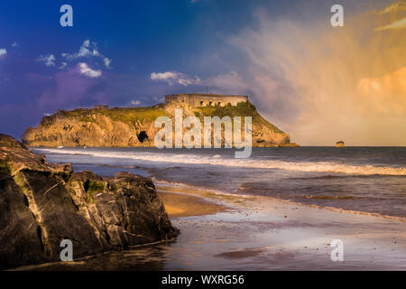 Coast with beach and monuments, Wales Stock Photo - Alamy