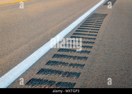 safety rumble strips on a highway shoulder to reduce run-off-road ...