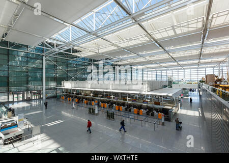 Airport, terminal, Lufthansa, check in, machines, travellers, no ...