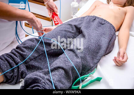 CHILD WITH ECG HOLTER Stock Photo - Alamy