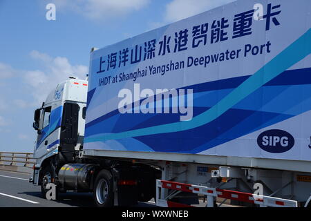 A 5G-featured container truck of IHDT (Intelligent Heavy-Duty Truck) of ...