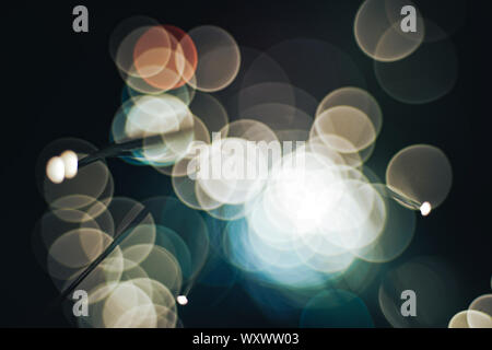 Beautiful optical fiber white light bokeh on a dark background Stock ...