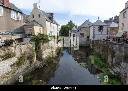 Bayeux, France - August 14, 2016: Water mill and Aure River in the old ...