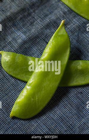Snow peas are a legume in which both the peas and the pod are edible ...