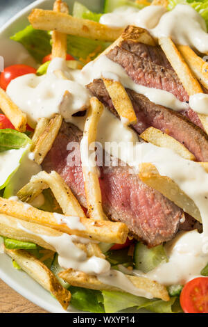 Homemade Pittsburgh Salad with Steak and French Fries Stock Photo - Alamy