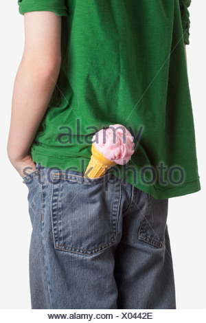 A Boy With An Ice Cream Cone In His Back Pocket Stock Photo - Alamy