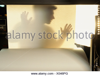 Silhouette of man behind sheet Stock Photo: 38136495 - Alamy