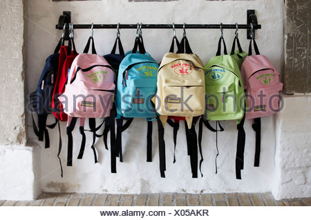 Backpacks hanging on a wall Stock Photo: 22735999 - Alamy