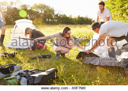 People pitching tents at campsite Stock Photo: 38124938 - Alamy