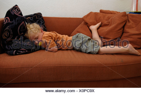 Little boy sleeps on sofa Stock Photo: 7521783 - Alamy