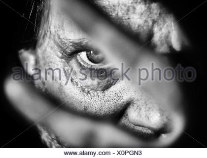 Close up on man face with serious or regret facial expression. Portrait ...