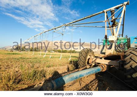 Mobile irrigation sprinkler system in use on the Canterbury Plains, New ...