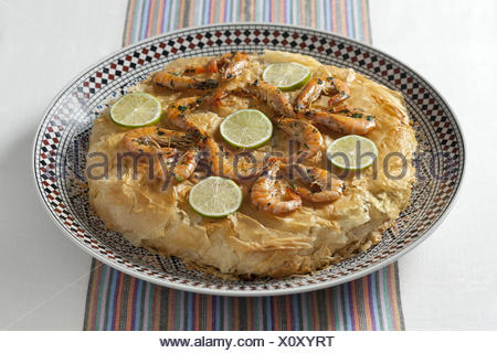 Fresh baked traditional Moroccan fish pastilla close up Stock Photo - Alamy