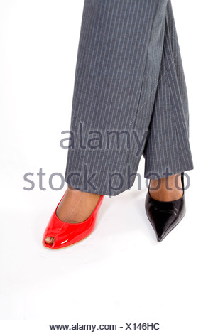businesswoman wearing two different shoes Stock Photo: 23220600 - Alamy