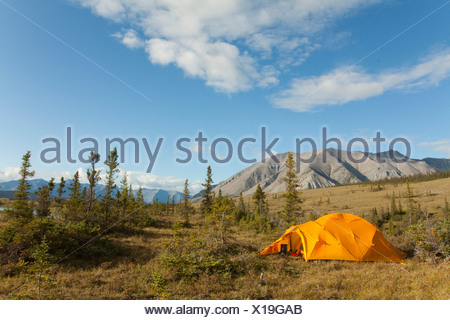 Expedition tent, arctic tundra, camping, Mackenzie Mountains behind ...