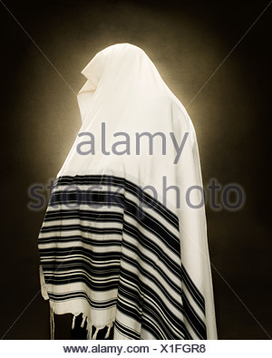 An Orthodox Jewish man wearing traditional clothing passionately Stock ...