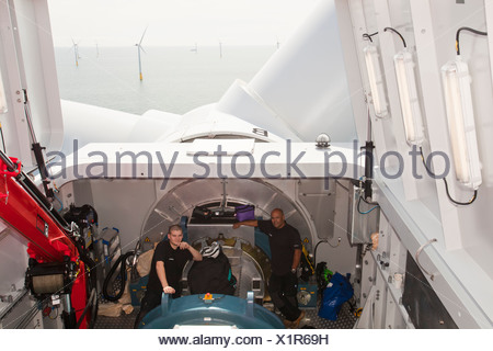 engineers working in the nacelle of a wind turbine in the Walney Stock Photo - Alamy