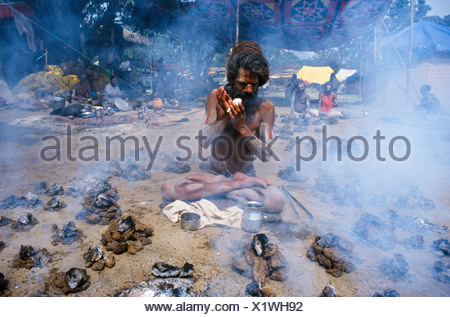 Dhuni Tapa, symbolic self-sacrifice of sadhus to Agni, the God of Stock ...