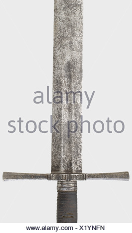 A German executioner's sword,dated 1692 Heavy,double-edged blade with ...
