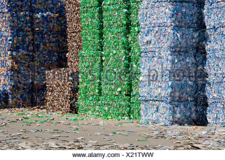 plastic bottles, sorted by colour, compressed into bales and ready ...