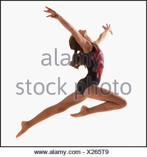 Female gymnast leaping Stock Photo - Alamy