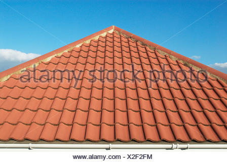 Terracotta roof tiles and guttering Stock Photo - Alamy