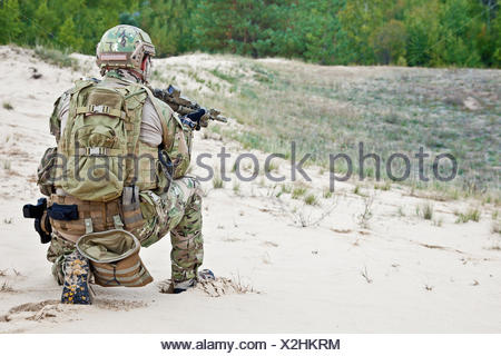 US soldier in the desert during the military operation Stock Photo ...