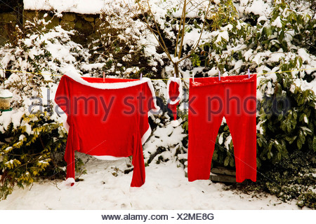 Santa claus laundry hanging on a clothesline in the sky Stock Photo ...