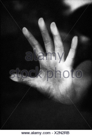 Hand pressing against glass, close-up, b&w Stock Photo: 5436318 - Alamy