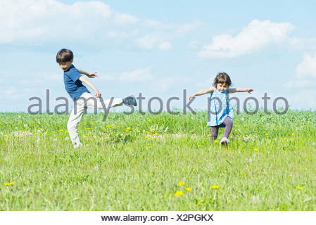 Boy running with arms outstretched pretending to be airplane Stock ...
