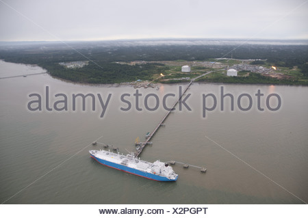 Tanker LNG loading gas from terminal in the seaport at LNG base Stock ...