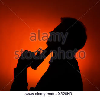 silhouette of the man pointing gun to his head Stock Photo - Alamy
