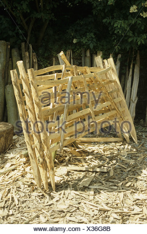 Newly made wooden sheep hurdles outside workshop, Shropshire, England ...