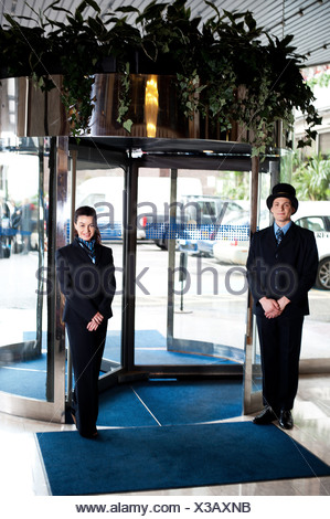 Security man or doorman concierge at entrance to Dakota Building by ...