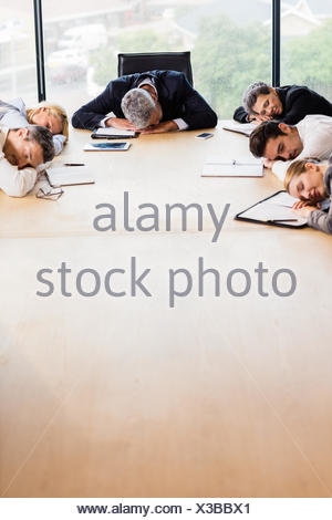 Business team sleeping at meeting Stock Photo - Alamy
