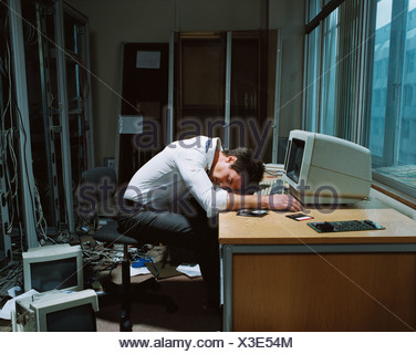 Office worker dead at his desk Stock Photo: 4822123 - Alamy