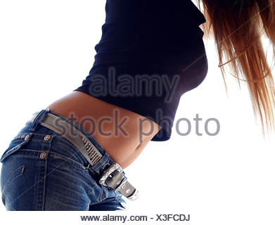 Woman, young, slender, jeans, bare midriff, pose, side view, curled ...