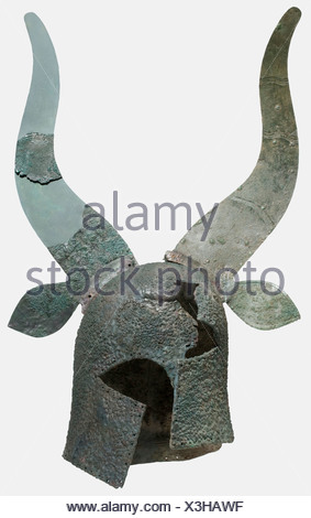 A Corinthian helmet with decorative horns, 7th - 6th century B.C Stock ...