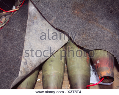 A 155mm high-explosive artillery shell is blasted out of a M198 Stock ...