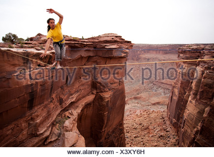 Highlining at the Fruit Bowl in Moab, Utah Stock Photo - Alamy