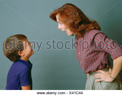 Mother reprimanding her son Stock Photo - Alamy