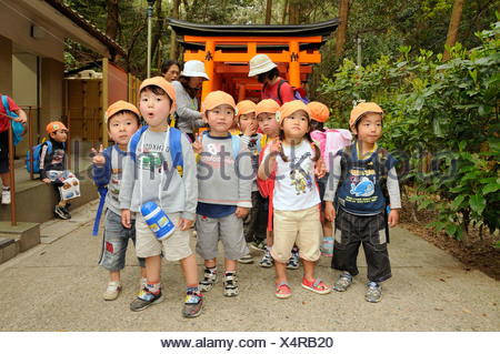 Japanese kindergarten children visiting the Fujimi Shrine in Kyoto ...