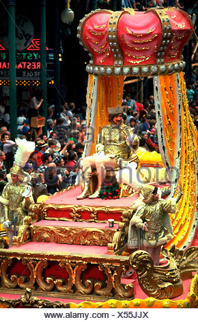 The elaborate parade float of Rex King of Mardi Gras with onlooking ...